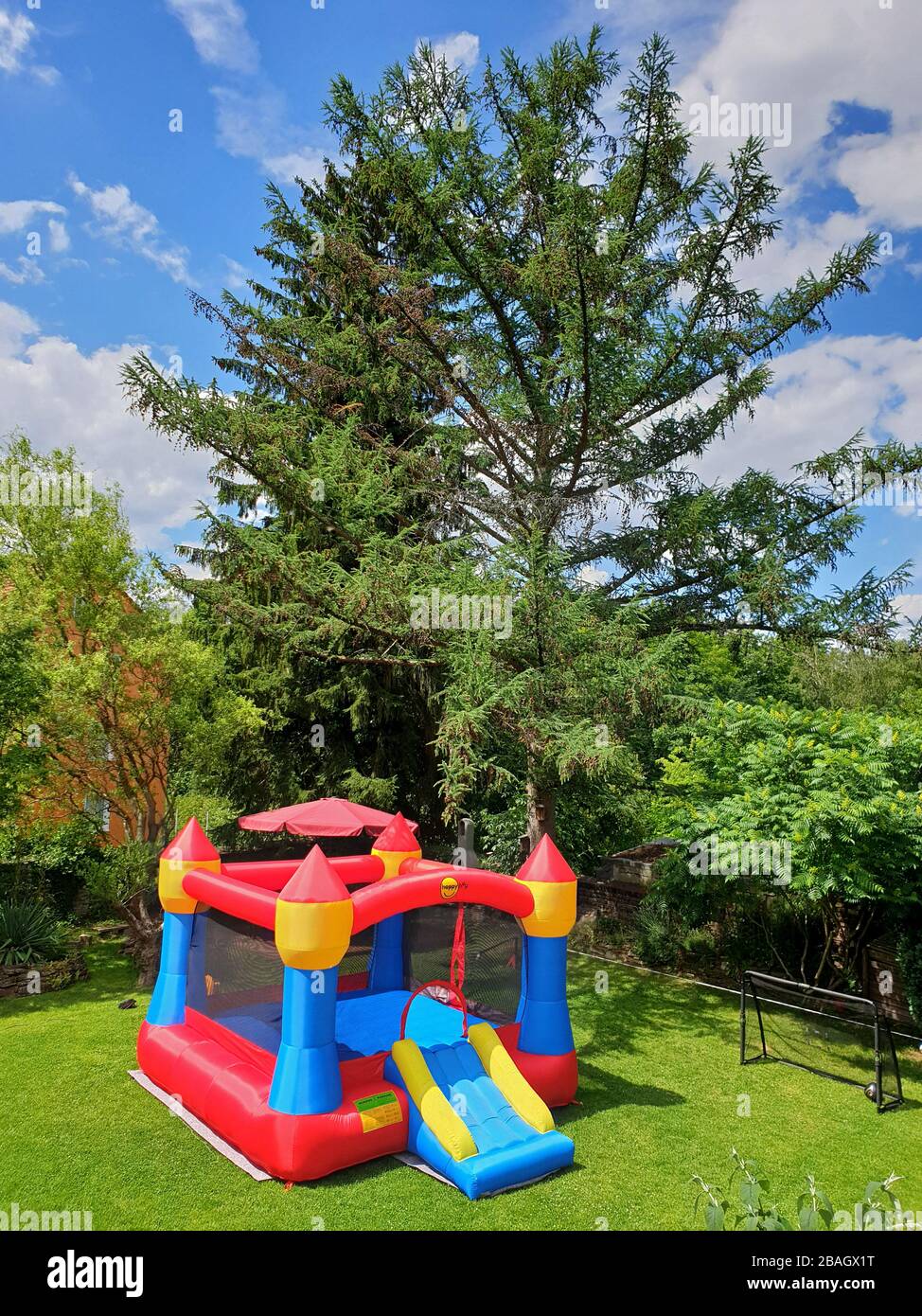 giant bouncy castle in garden, Germany Stock Photo - Alamy