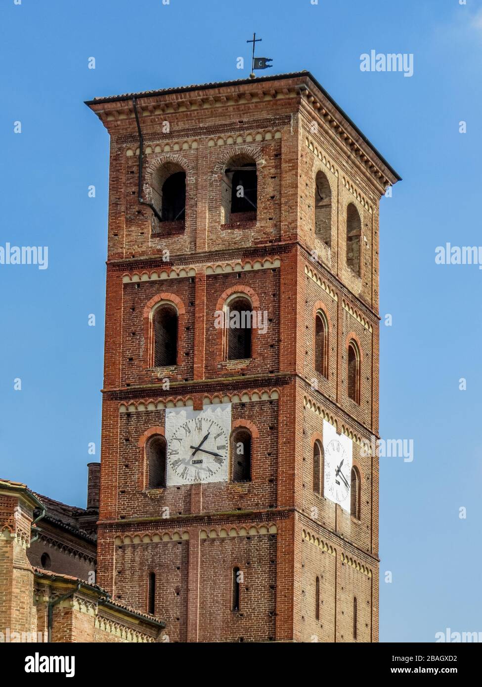 Medieval clock tower over blue sky Stock Photo - Alamy