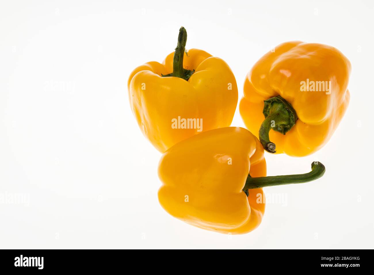 Close up view of fresh yellow paprika isolated on white background ...