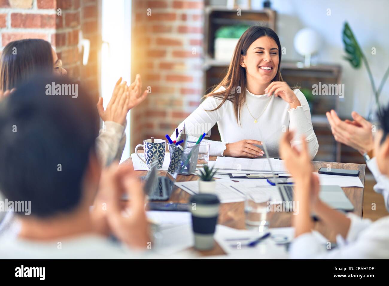 Group of business workers smiling happy and confident. Working together ...