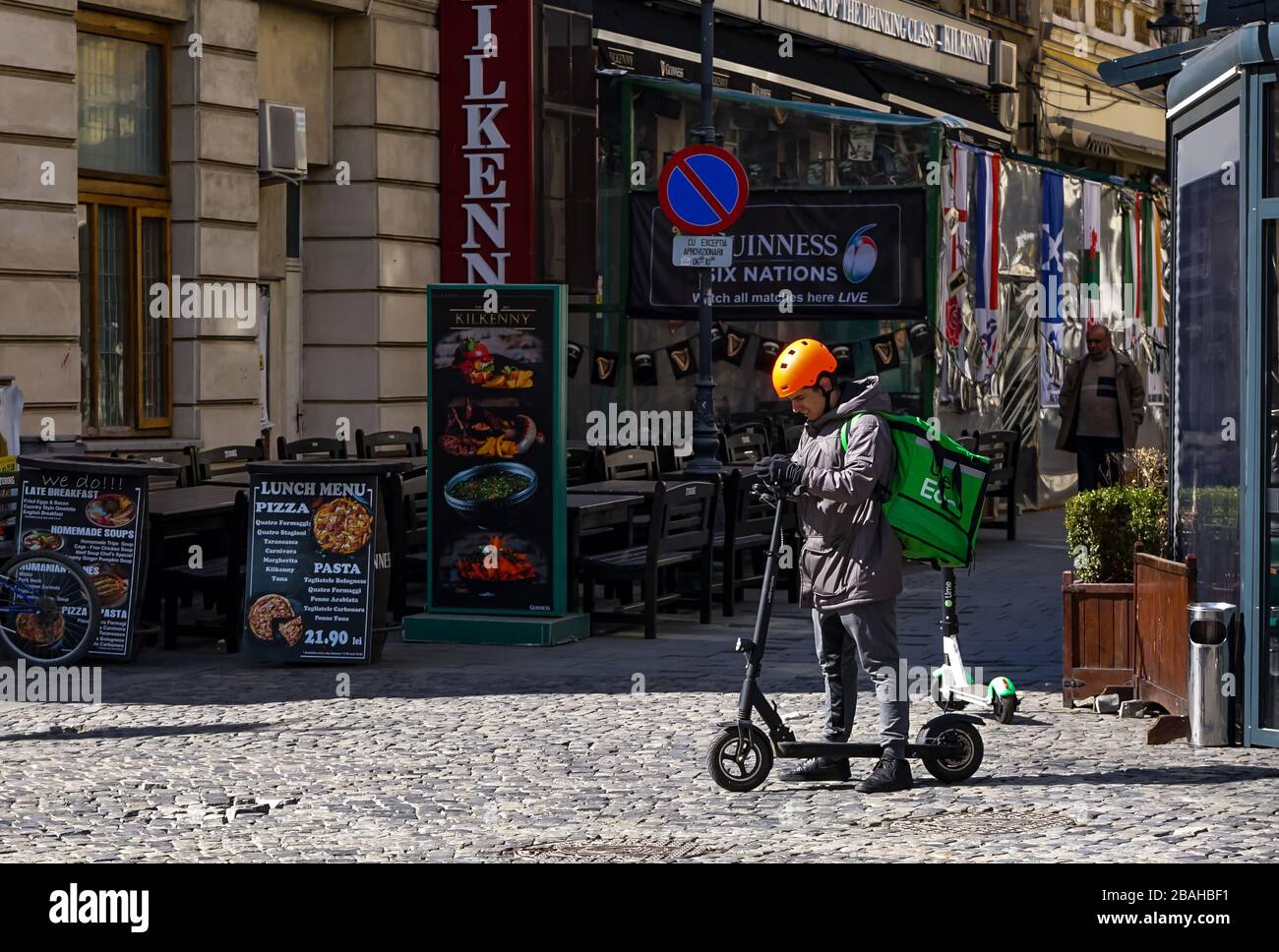 Bucharest, Romania - March 17, 2020: An Uber Eats food delivery courier ...