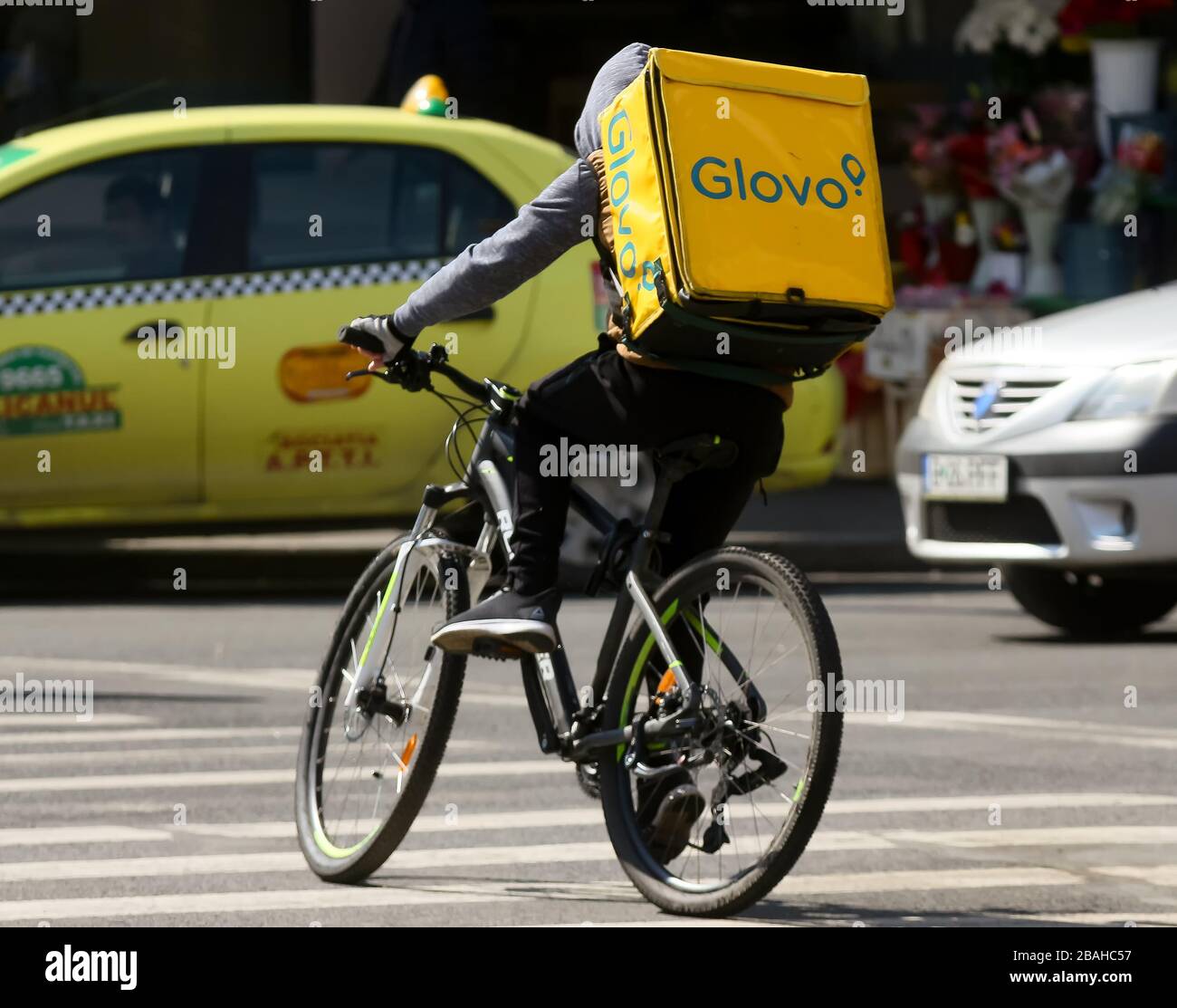 Bucharest, Romania - March 11, 2020: A Glovo food delivery courier ...