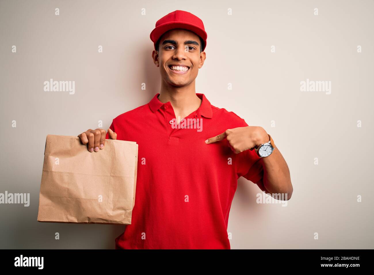 Smiling afro american man courier hi-res stock photography and images ...