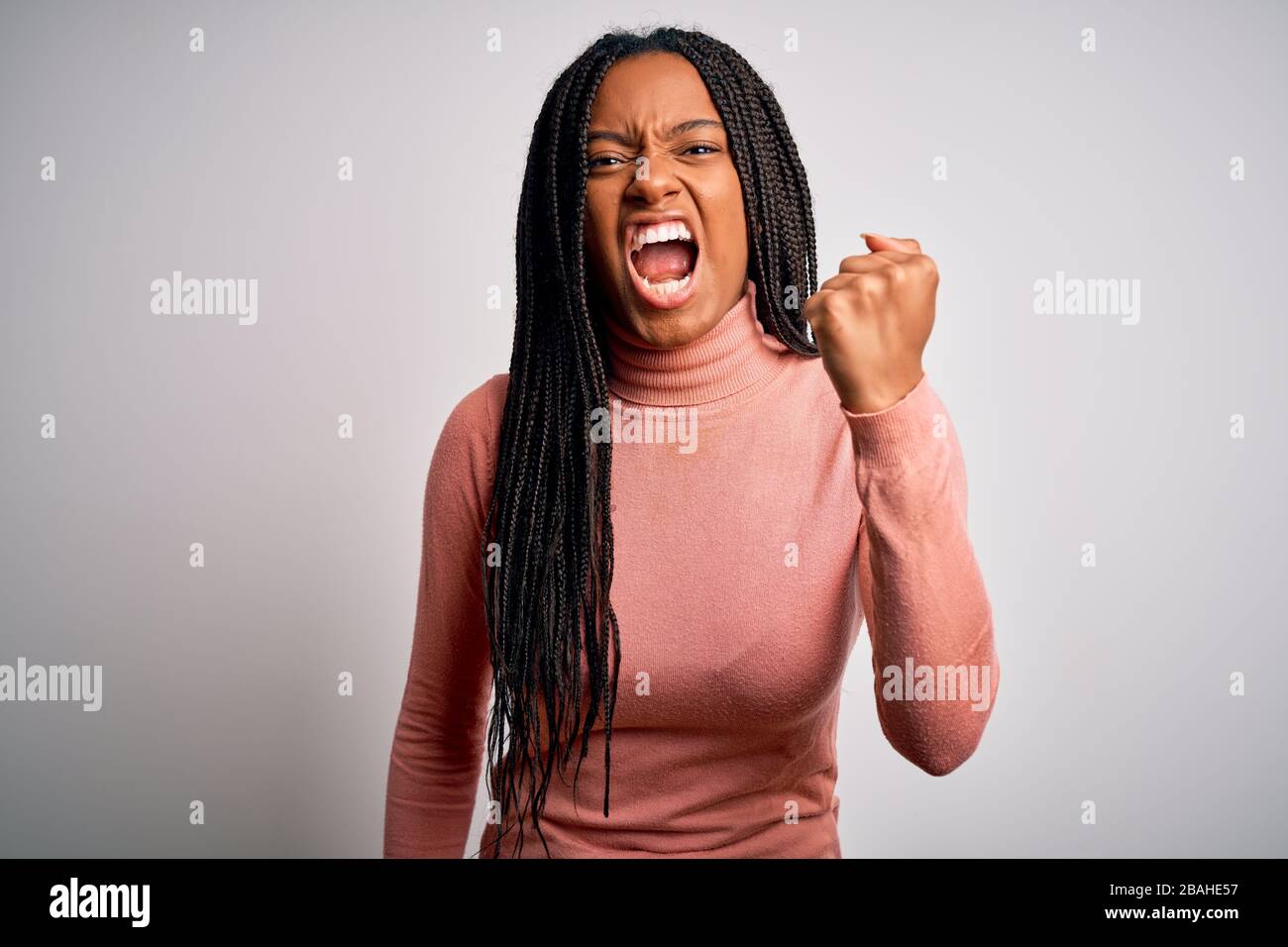 Young african american woman standing casual and cool over white ...