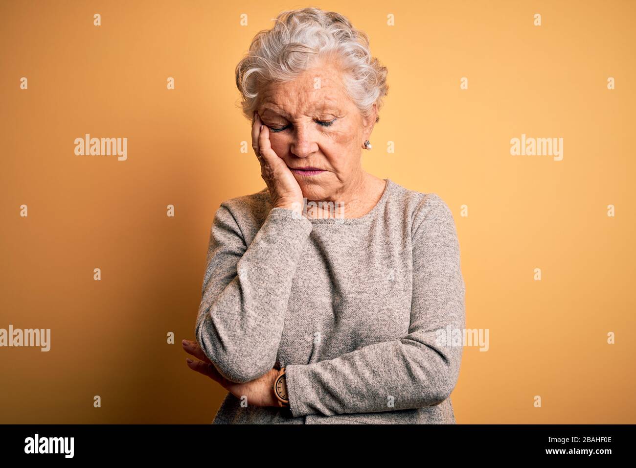 Senior beautiful woman wearing casual t-shirt standing over isolated ...