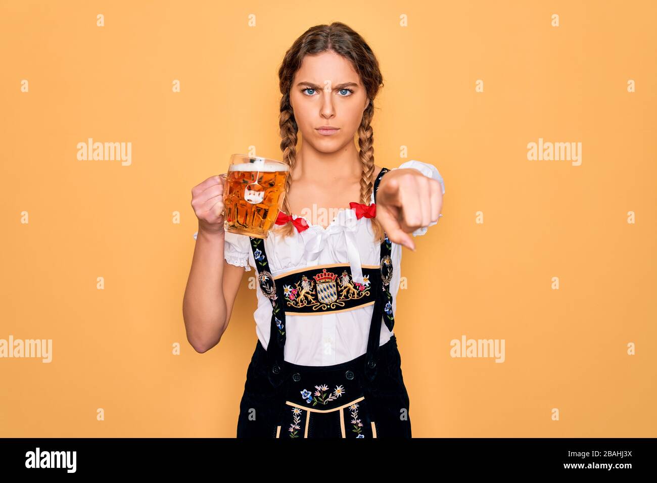 Beautiful blonde german woman with blue eyes wearing octoberfest dress ...