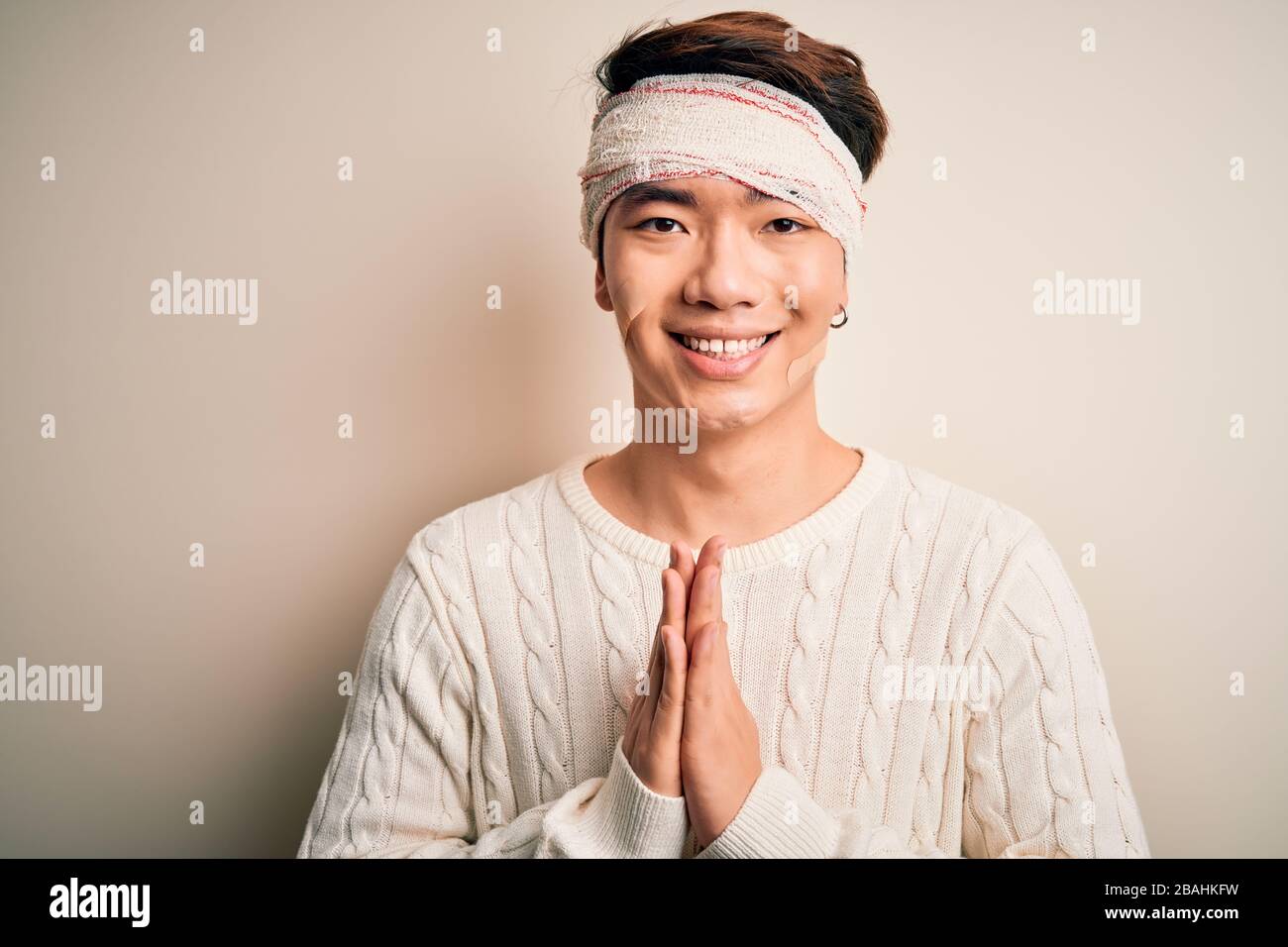Young handsome chinese man injured for accident wearing bandage and ...