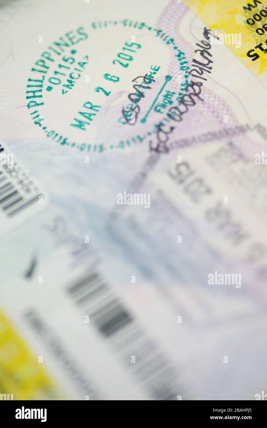 Stamp in passport indicating departure from the Philippines Stock Photo ...
