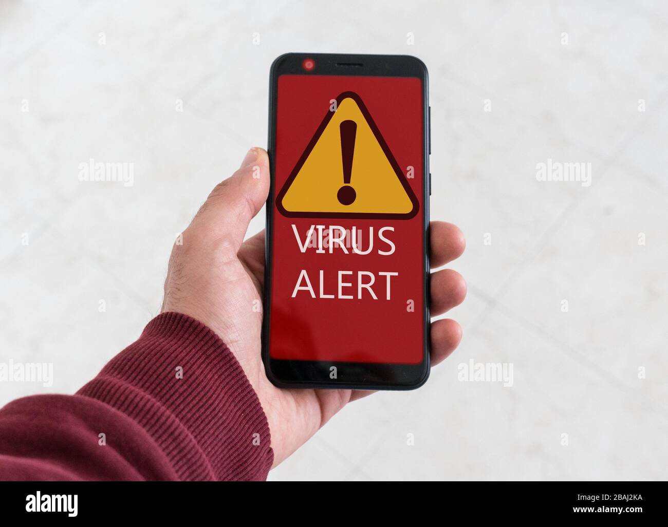 Virus alert message on red background on smartphone. Concept of warning ...