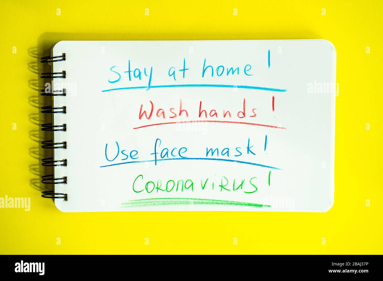 COVID-19 virus concept with note on pastel yellow background with copy ...