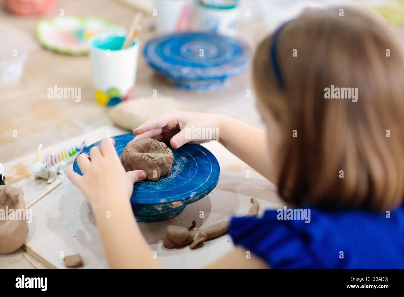 Child pottery hi-res stock photography and images - Alamy