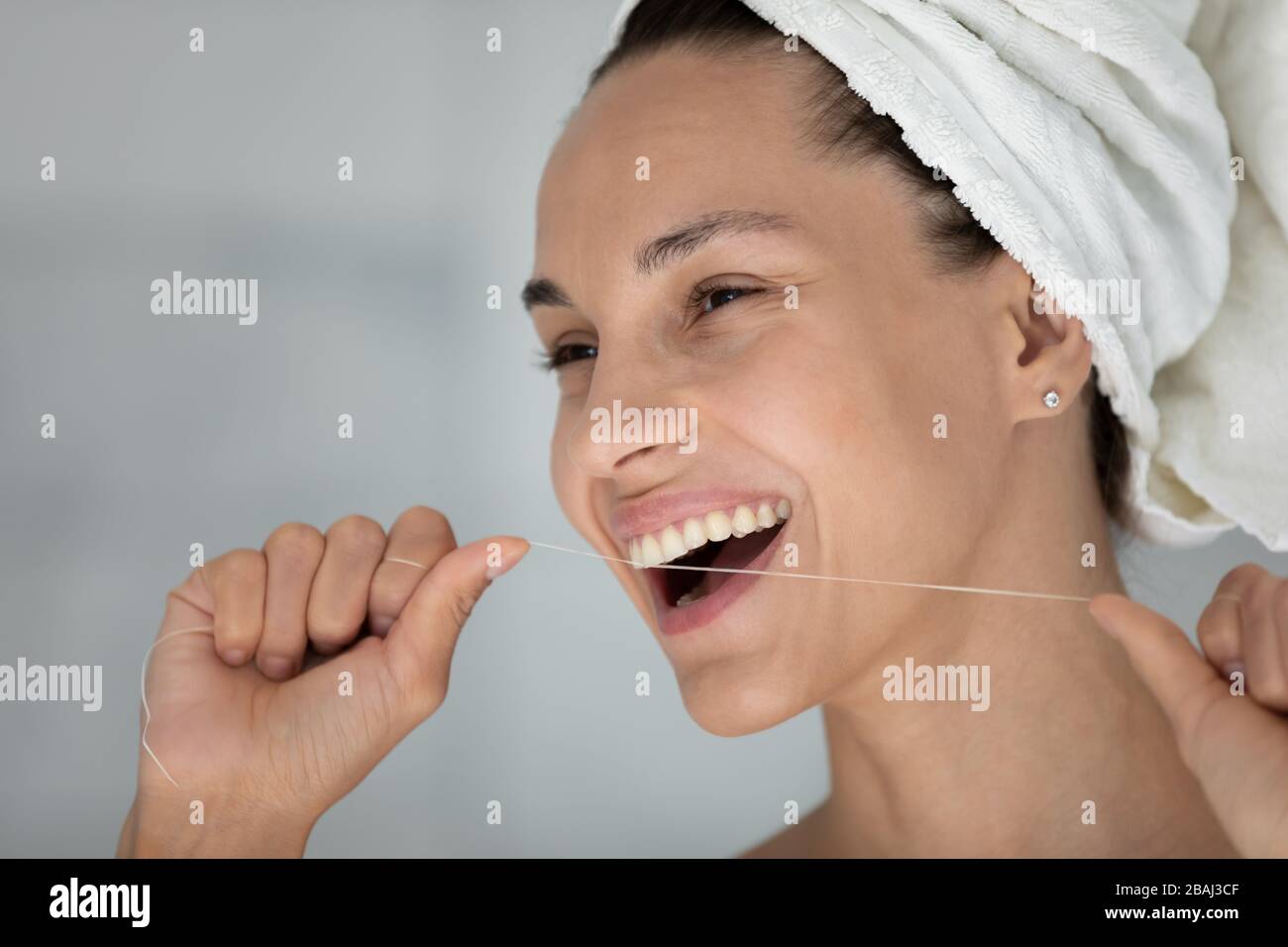 Beautiful smiling 30s woman holding dental floss cleaning teeth Stock ...