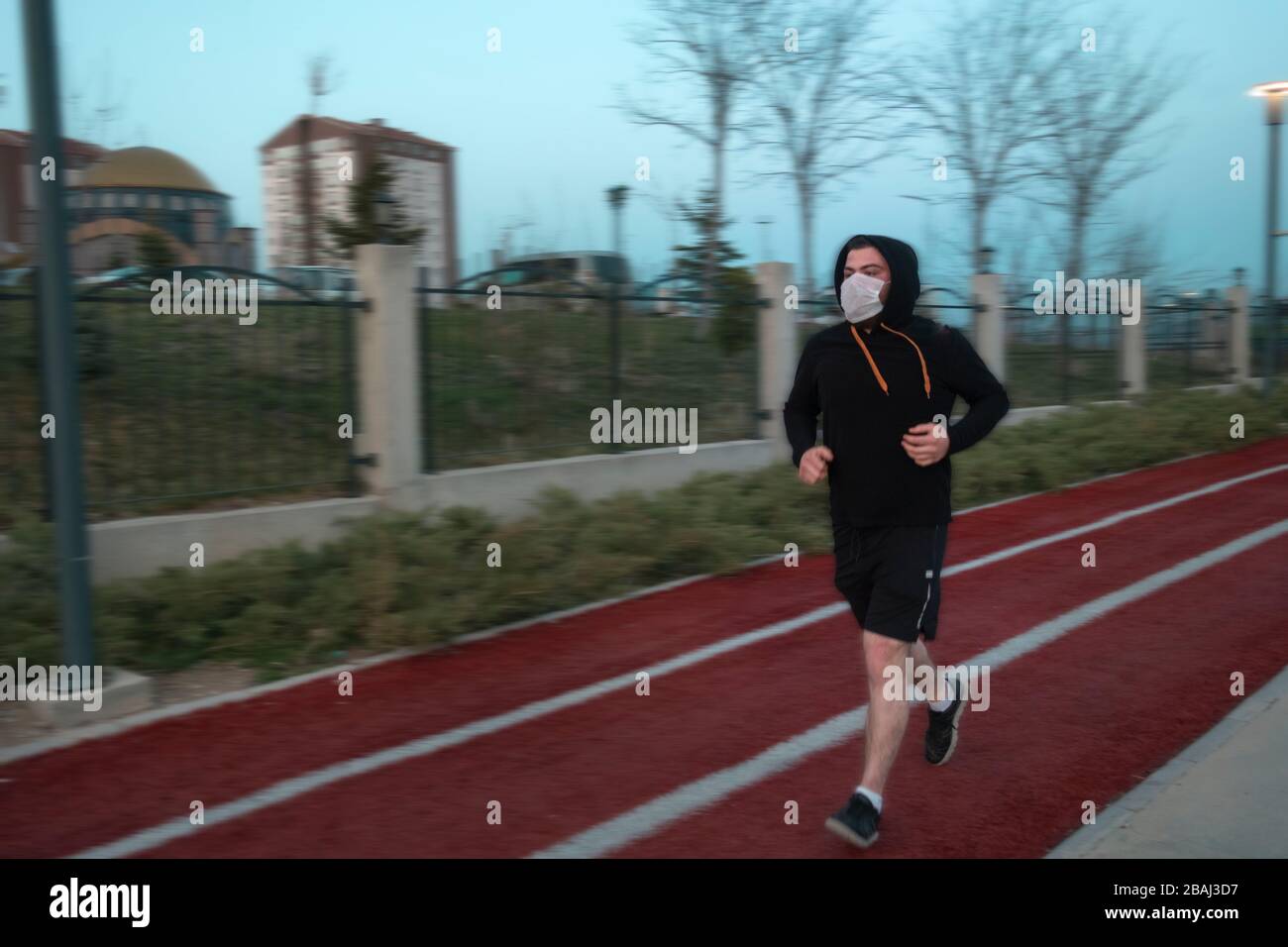 Hoodie wearing mask hi-res stock photography and images - Alamy