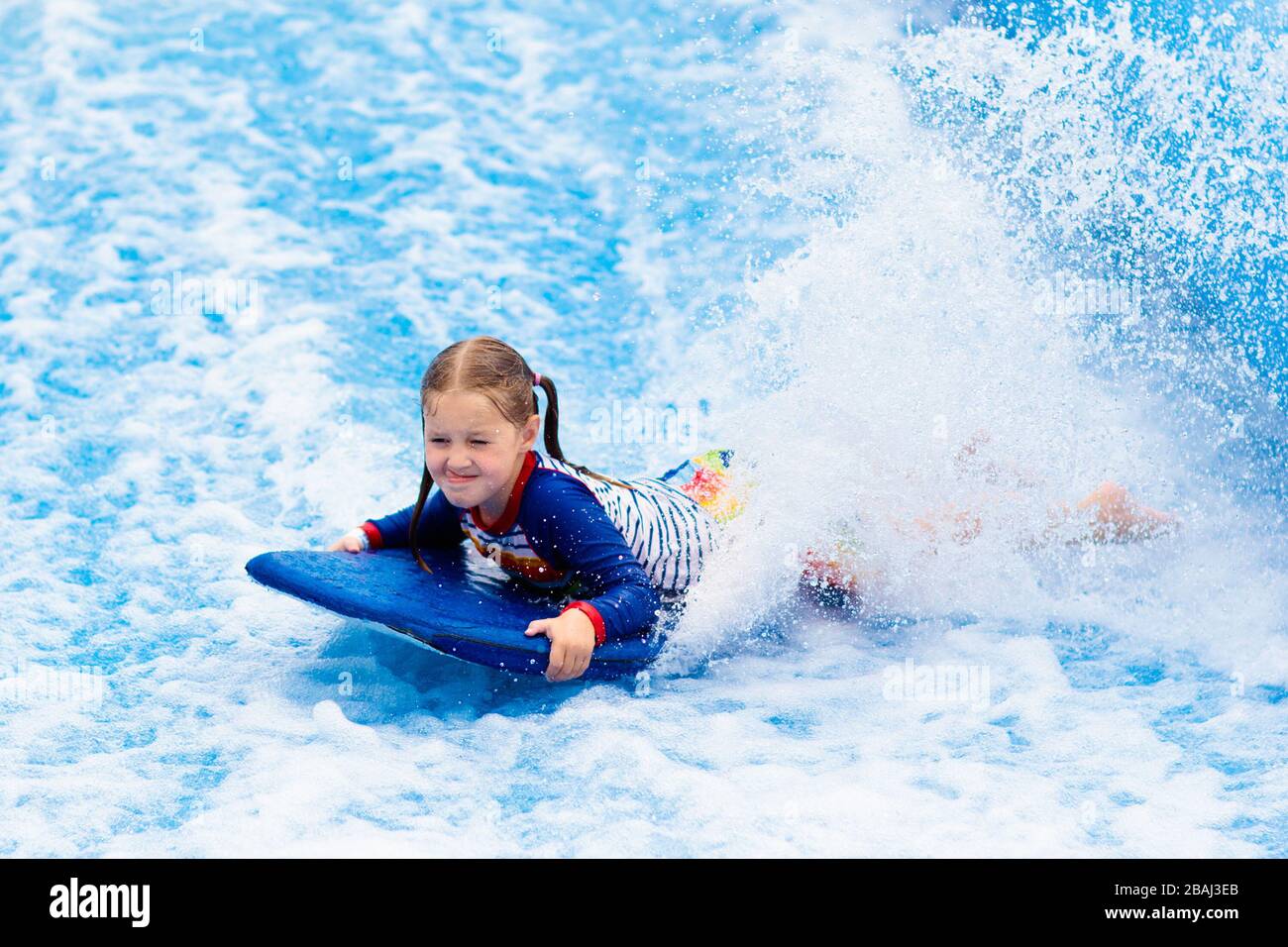 Girl surfing lesson hi-res stock photography and images - Alamy