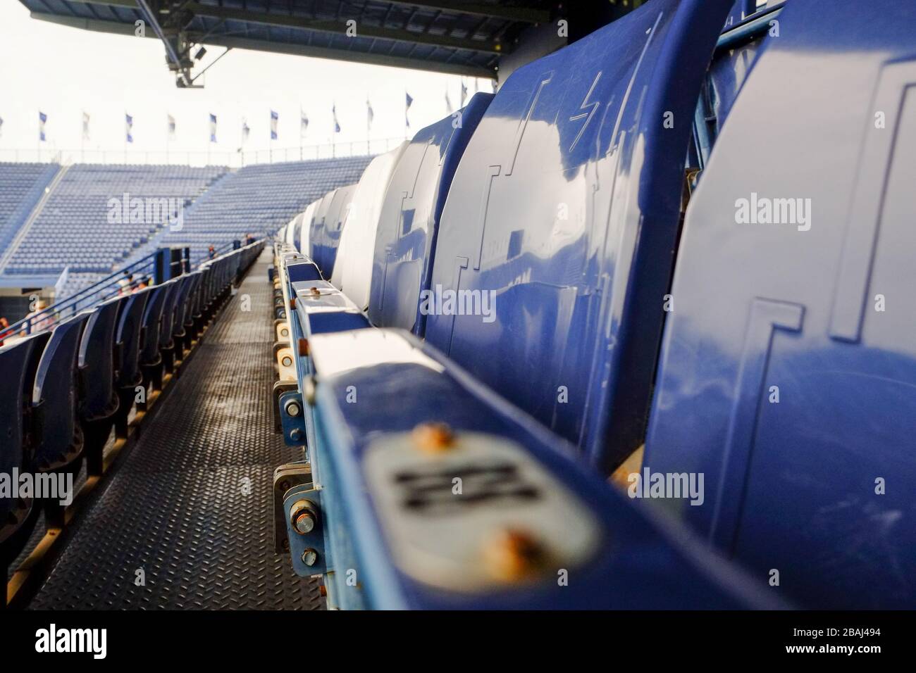 Navy blue amphitheater in football arena Stock Photo - Alamy