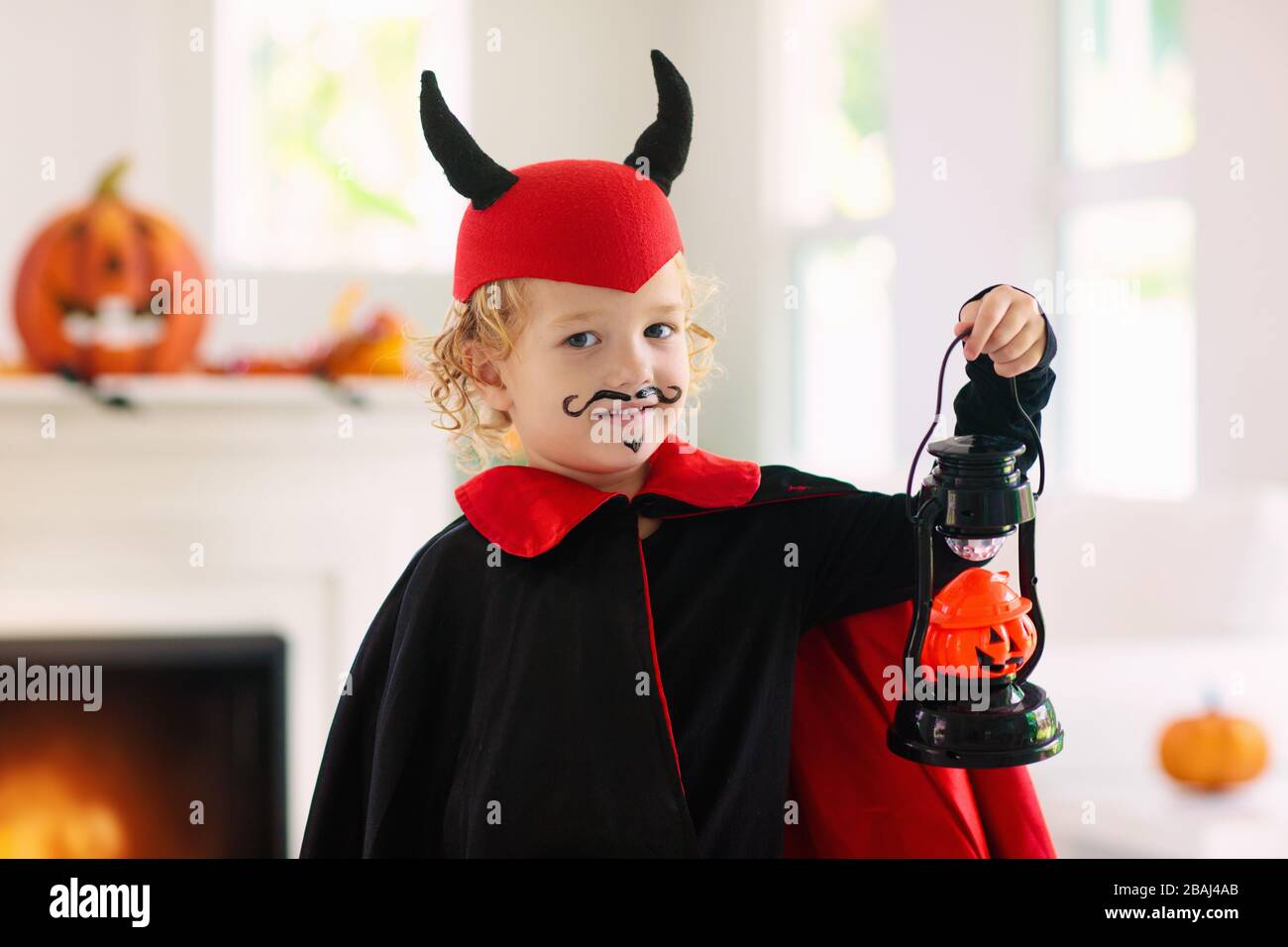 Child in Halloween costume. Kids trick or treat. Little boy dressed as ...
