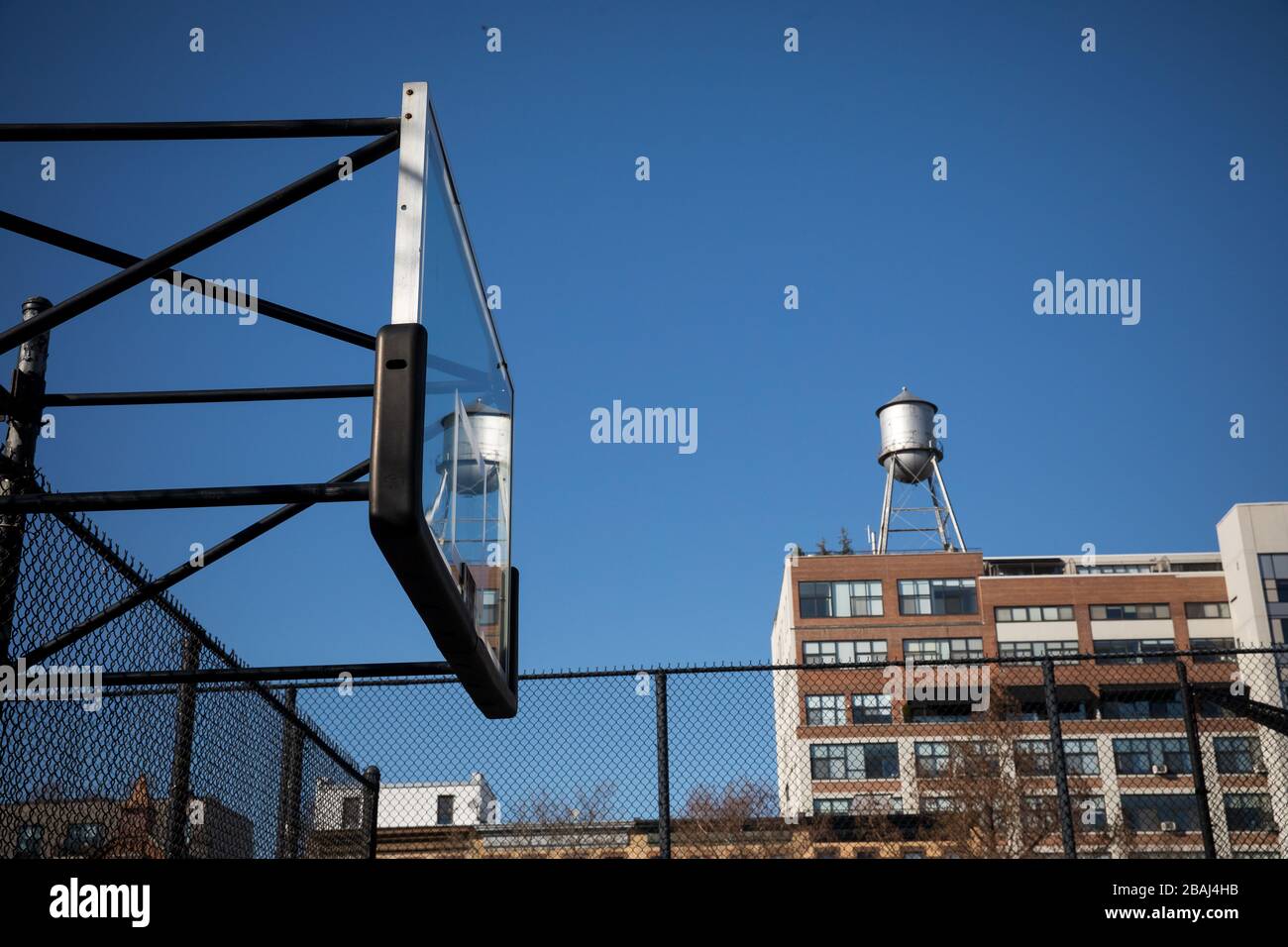 New York, USA. 27th Mar, 2020. A basketball backboard stands without ...