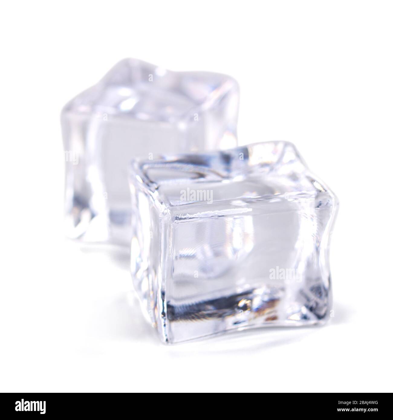 Pile of ice cubes isolated on white background Stock Photo - Alamy