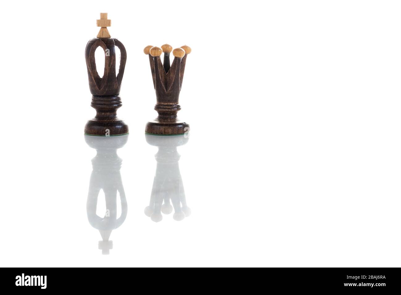 Close up photo of chess pieces isolated on a white background. Wooden ...