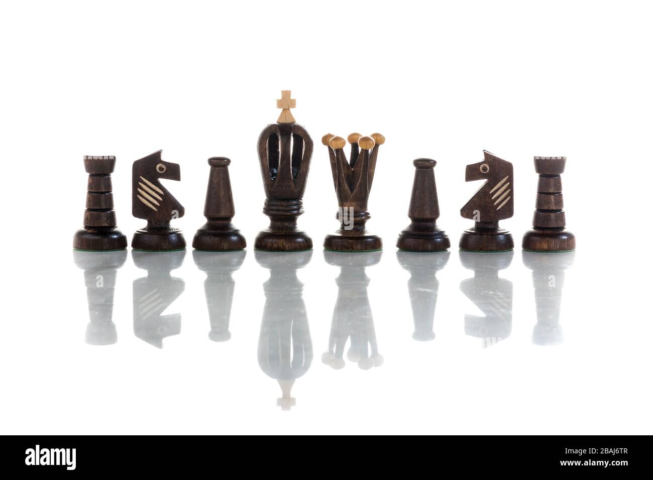 Close up photo of chess pieces isolated on a white background. Wooden ...