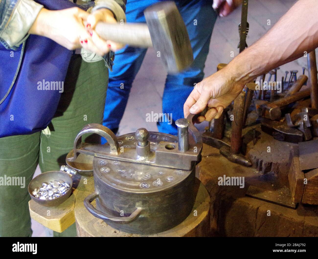 Production of aluminum coins, How to make coin Stock Photo - Alamy