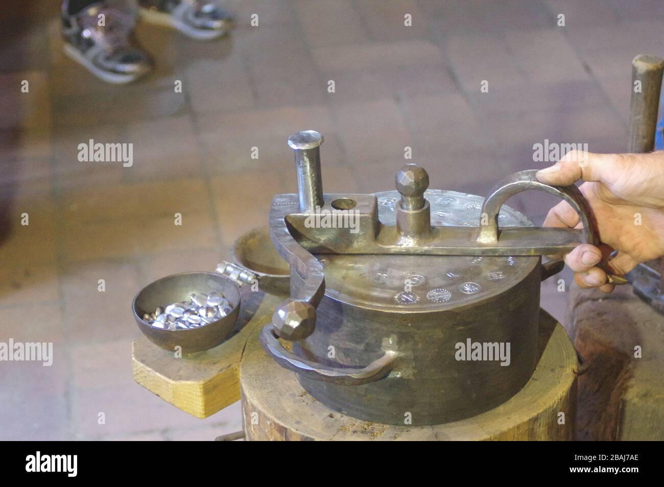 Production of aluminum coins, How to make coin Stock Photo - Alamy