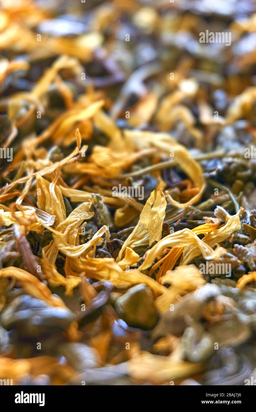 Herbal tea closeup. Multi coloured dried herbal tea leaves background ...