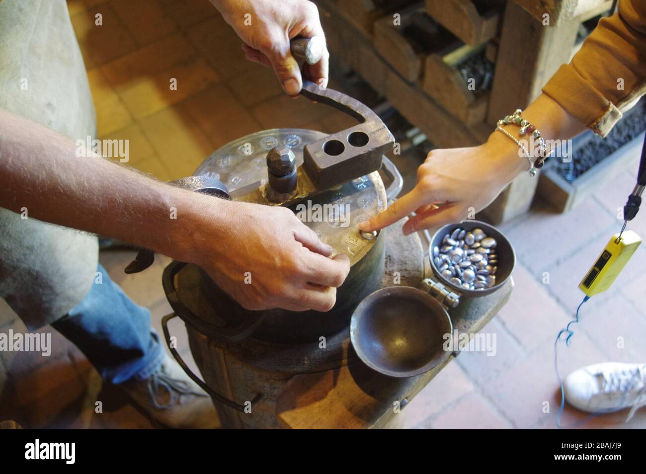 Production of aluminum coins, How to make coin Stock Photo - Alamy