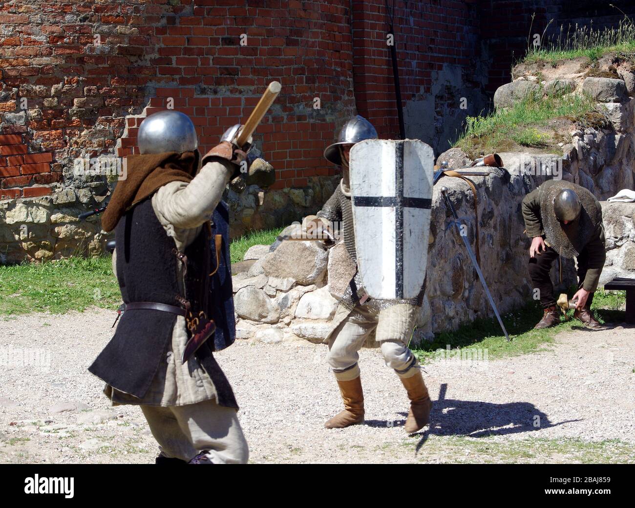 Medieval knight with sword and shield Stock Photo - Alamy