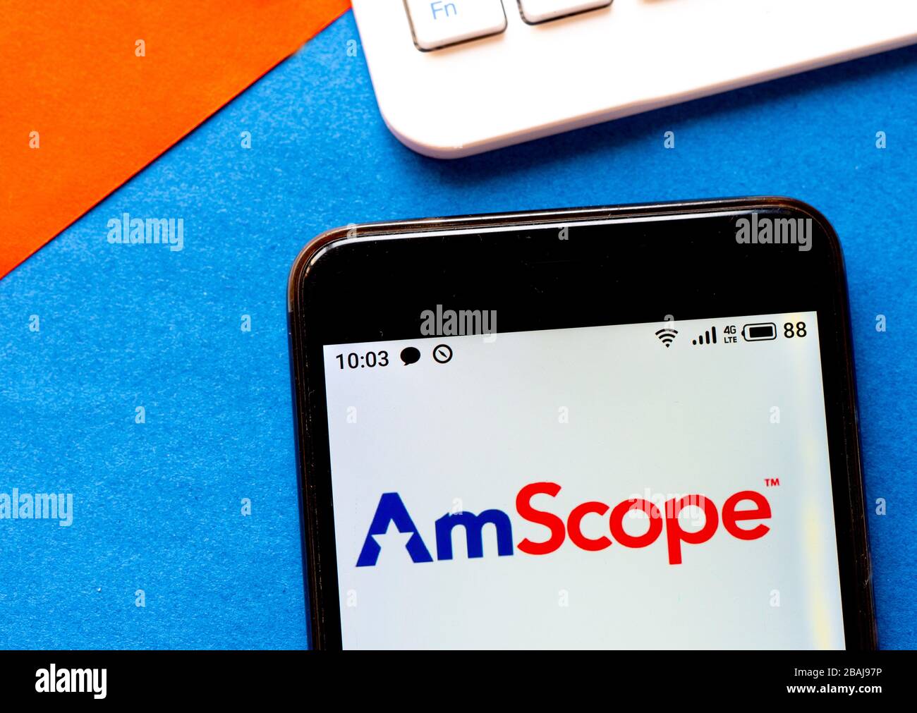In this photo illustration AmScope logo is seen displayed on a ...