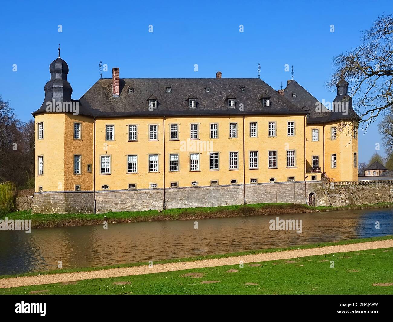 Yellow german castle Schloss Dyck in Juechen Stock Photo - Alamy