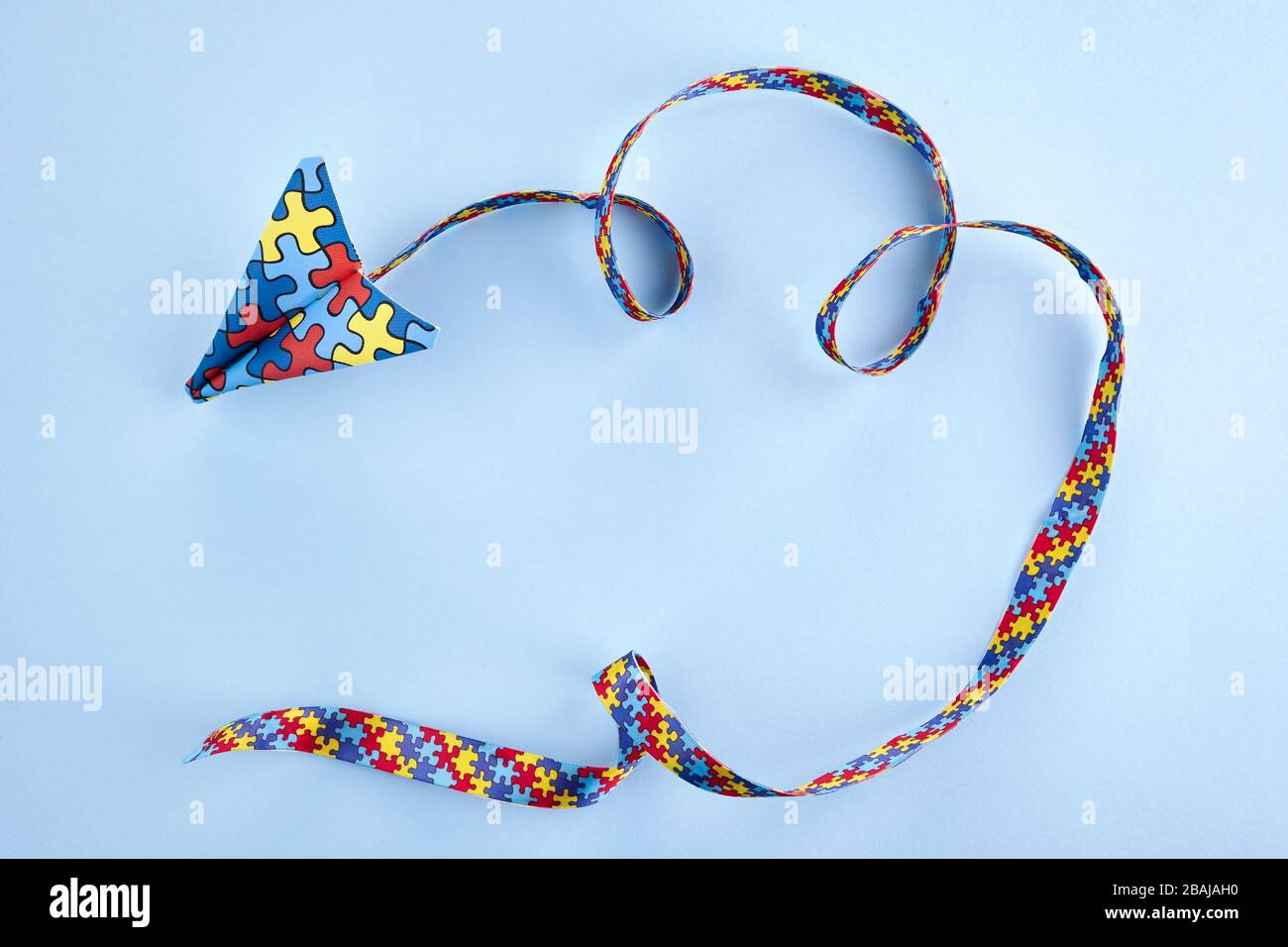 Autism awareness day or month. Paper plane in origami style with autism ...