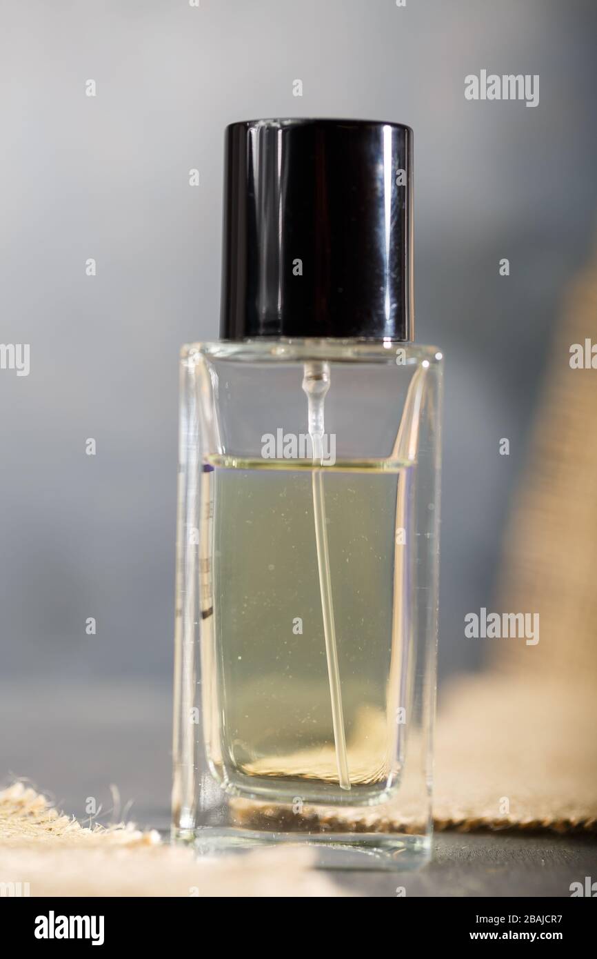 perfume bottle with black cap Stock Photo - Alamy