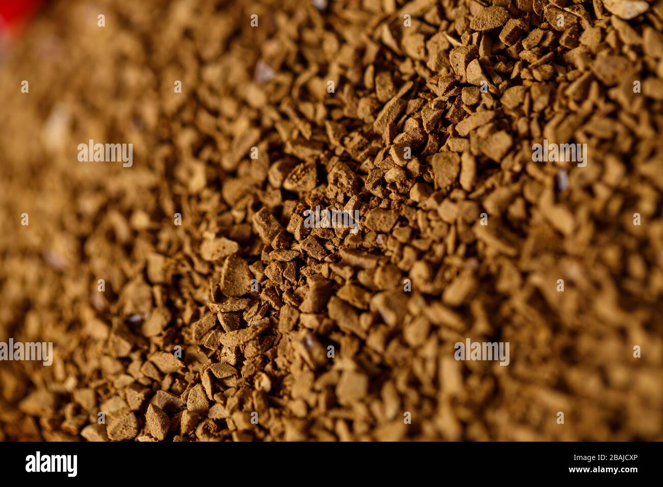 Granules of instant coffee background Stock Photo - Alamy