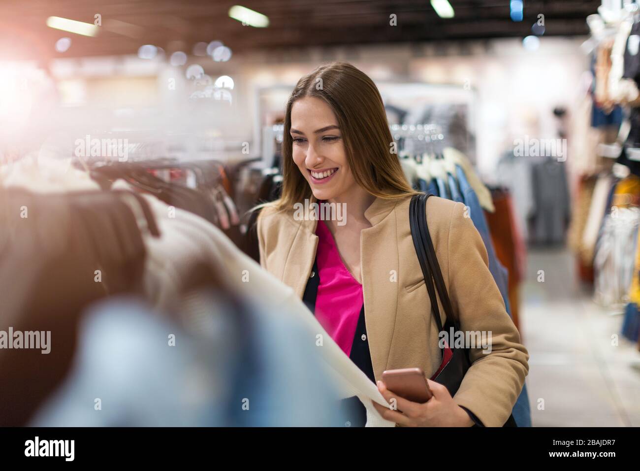 Woman in shopping mall hi-res stock photography and images - Alamy