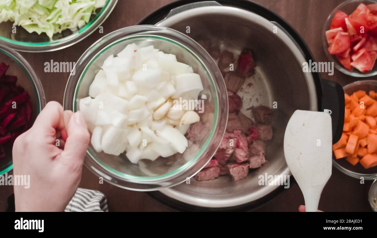 Step by step. Flat lay. Cooking beet soup, borscht with organic ...