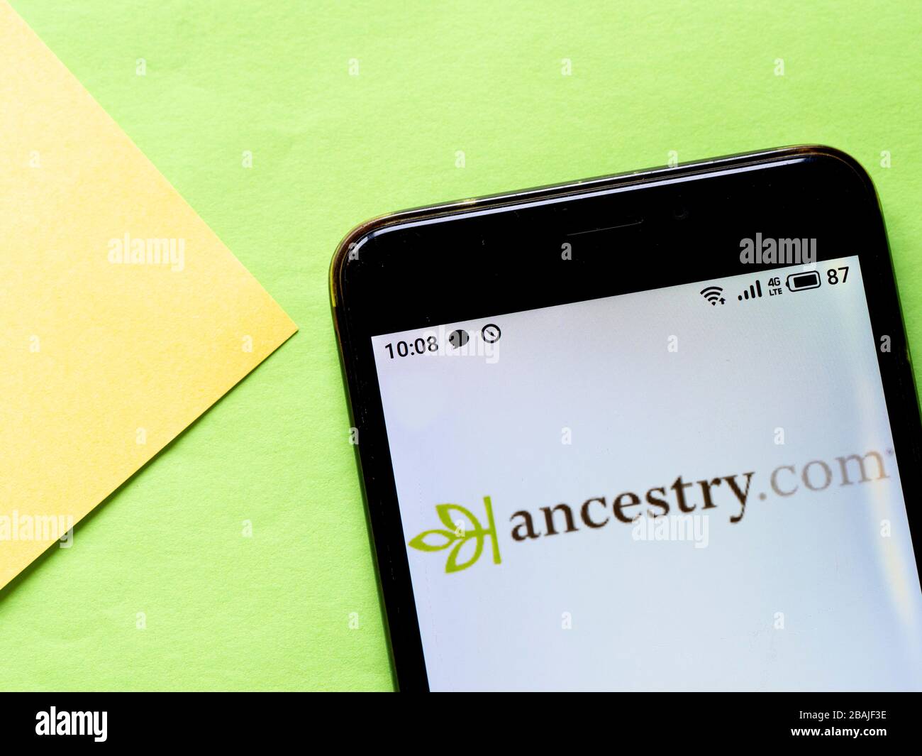 In this photo illustration an Ancestry.com logo seen displayed on a ...