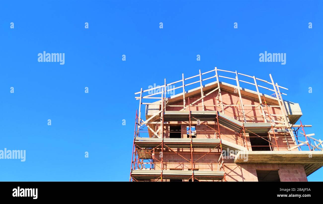 Reconstruction of block of houses with scaffolding Scaffold before ...