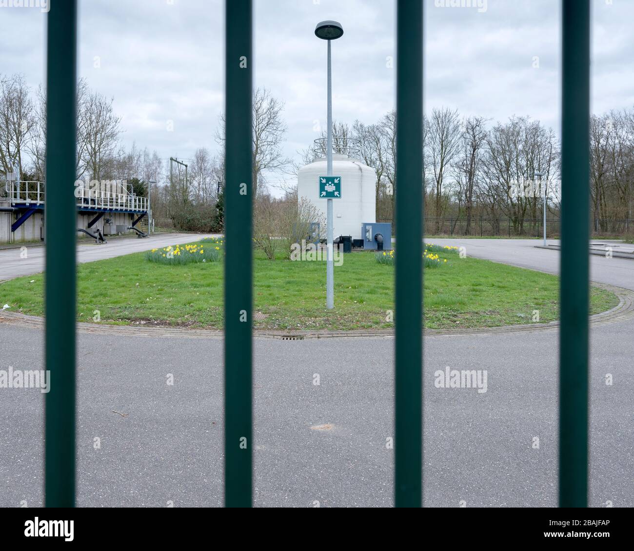 White assembly point sign on hi-res stock photography and images - Alamy