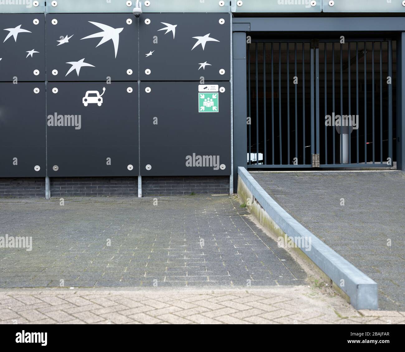 green meeting point sign in industrial environment on places where you ...