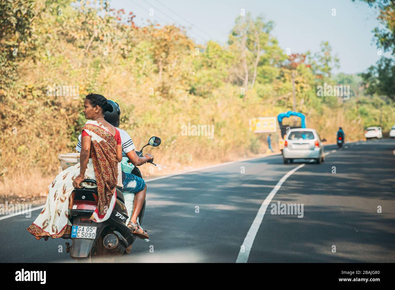 Indian woman on motorbike hi-res stock photography and images - Alamy