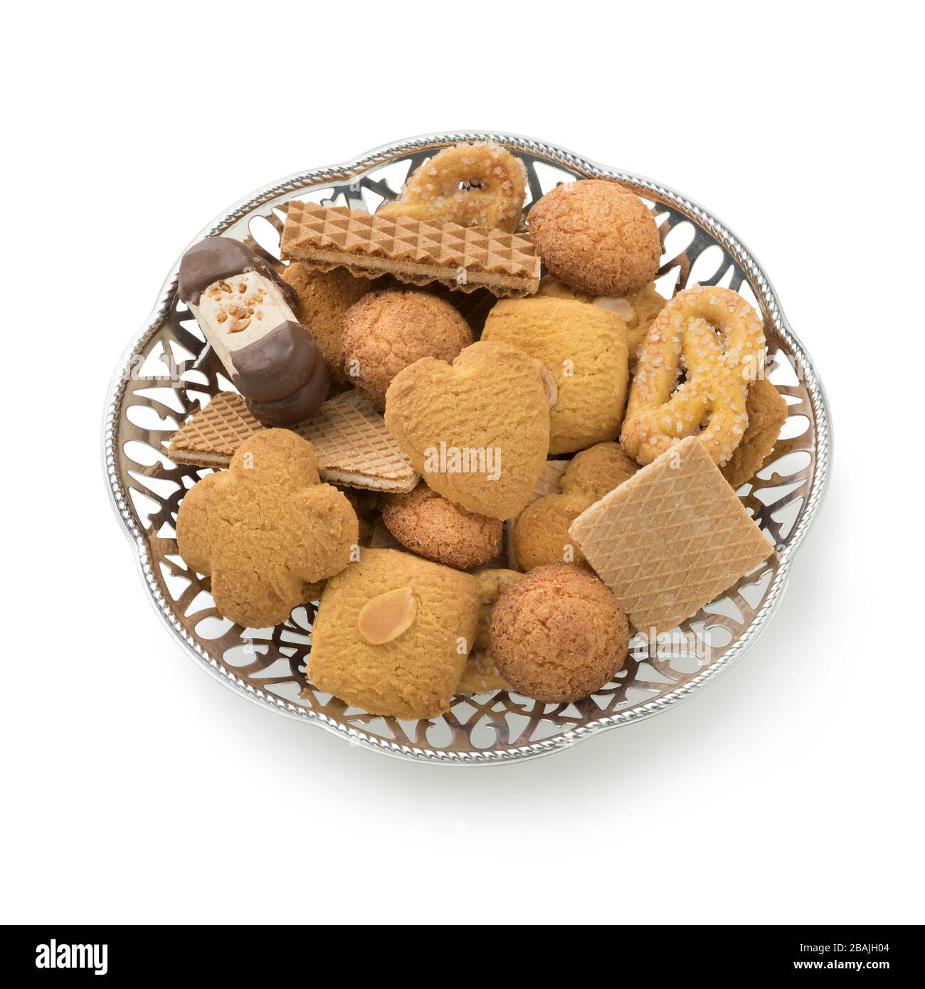 Bowl with a variation of dutch traditional cookies isolated on white ...