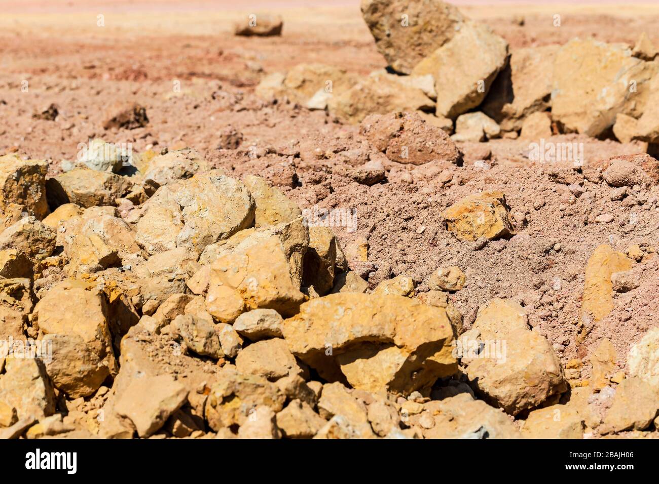 Mounds of soil and stones that were filled in the construction area ...