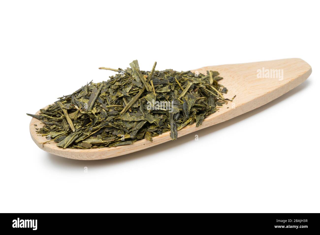 Spoon with healthy Japanese green tea close up isolated on white ...