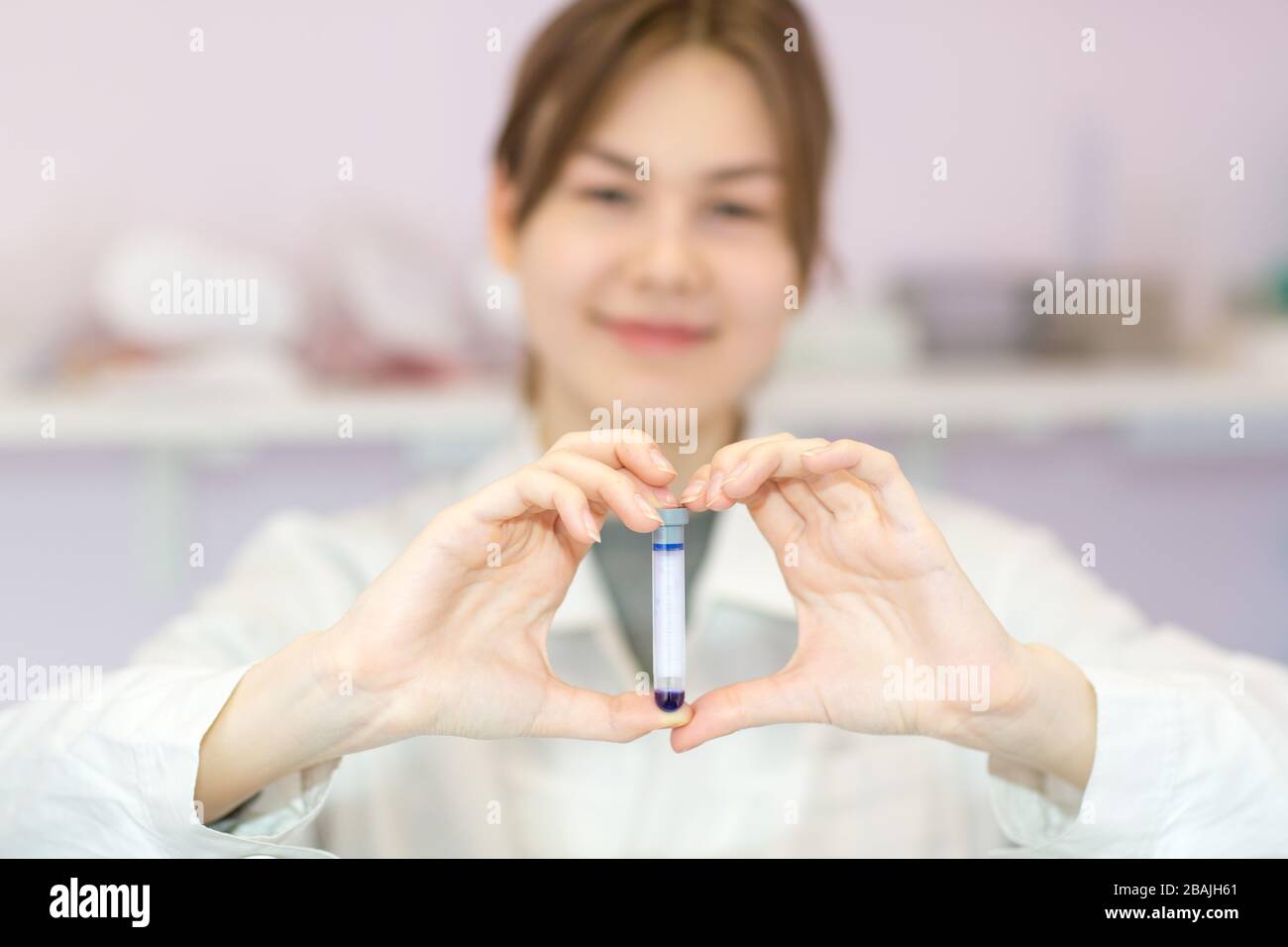 Doctor woman lab test tube hi-res stock photography and images - Alamy