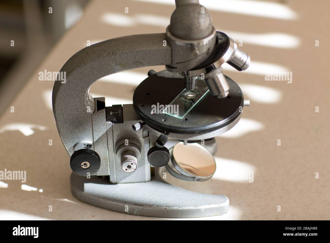 Microscope on the table. Research tests in the clinic Stock Photo - Alamy