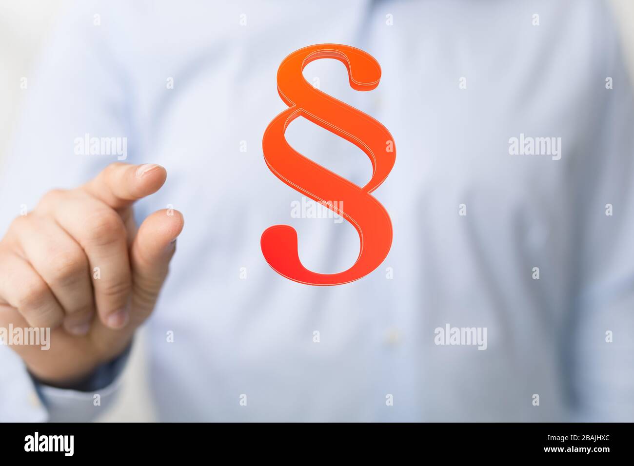 A paragraph law sign digital in hand Stock Photo - Alamy