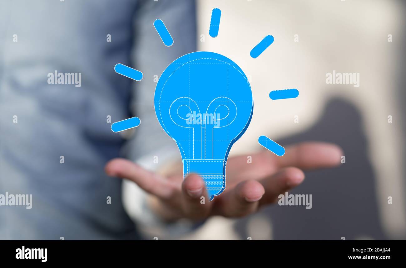A idea lamp concept in hand Stock Photo - Alamy