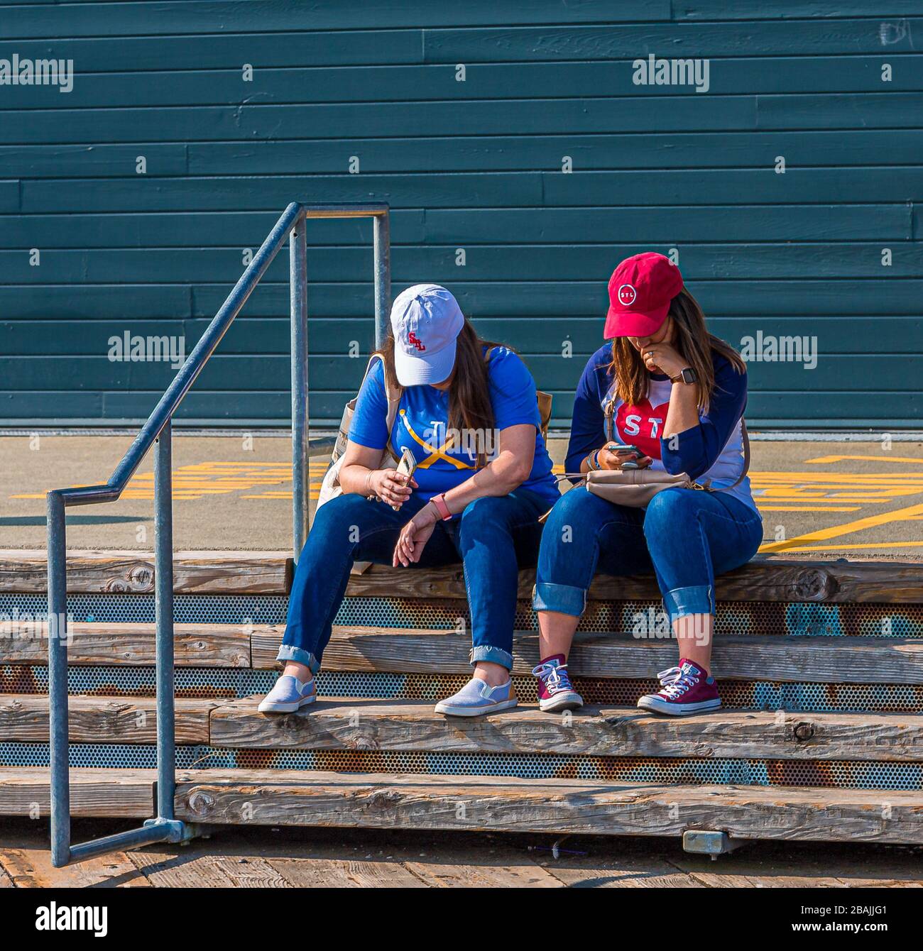 Two Women on Phones Stock Photo - Alamy