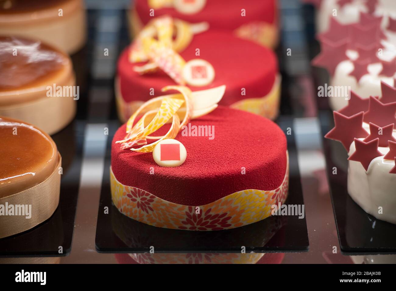 Assorted pastry cakes on display Stock Photo - Alamy